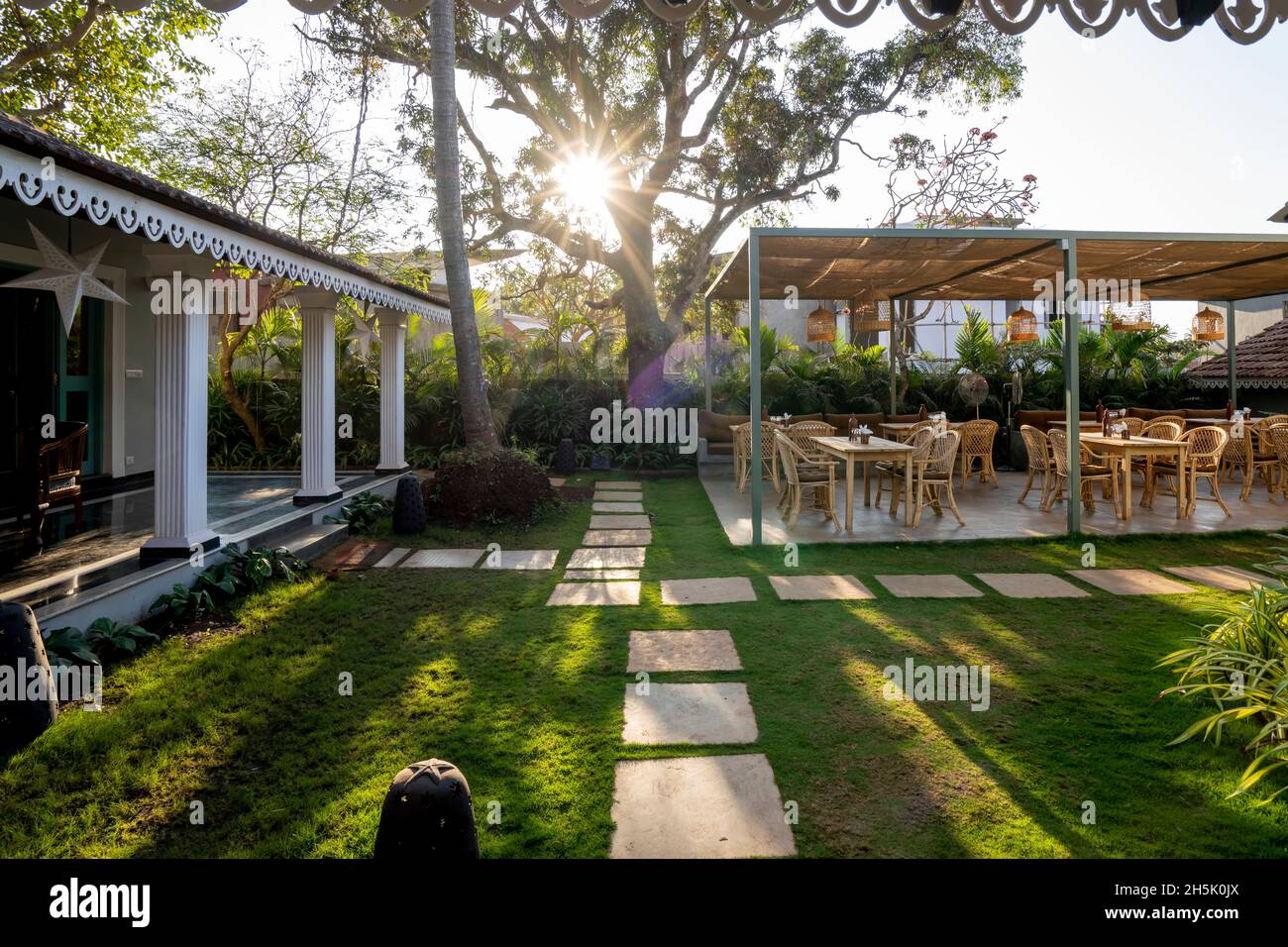 Outdoor courtyard of Edible Archives restaurant, Anjuna, Goa, India ...