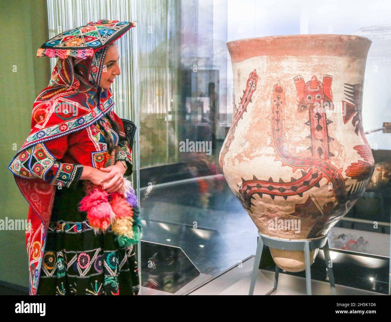 London UK 10 November 2021 Alexandra Fabian with a traditional costume ...