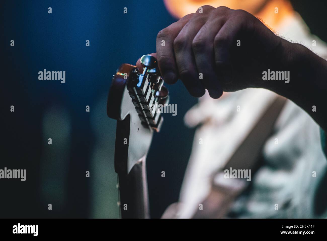 Closeup shot of a person playing guitar Stock Photo - Alamy