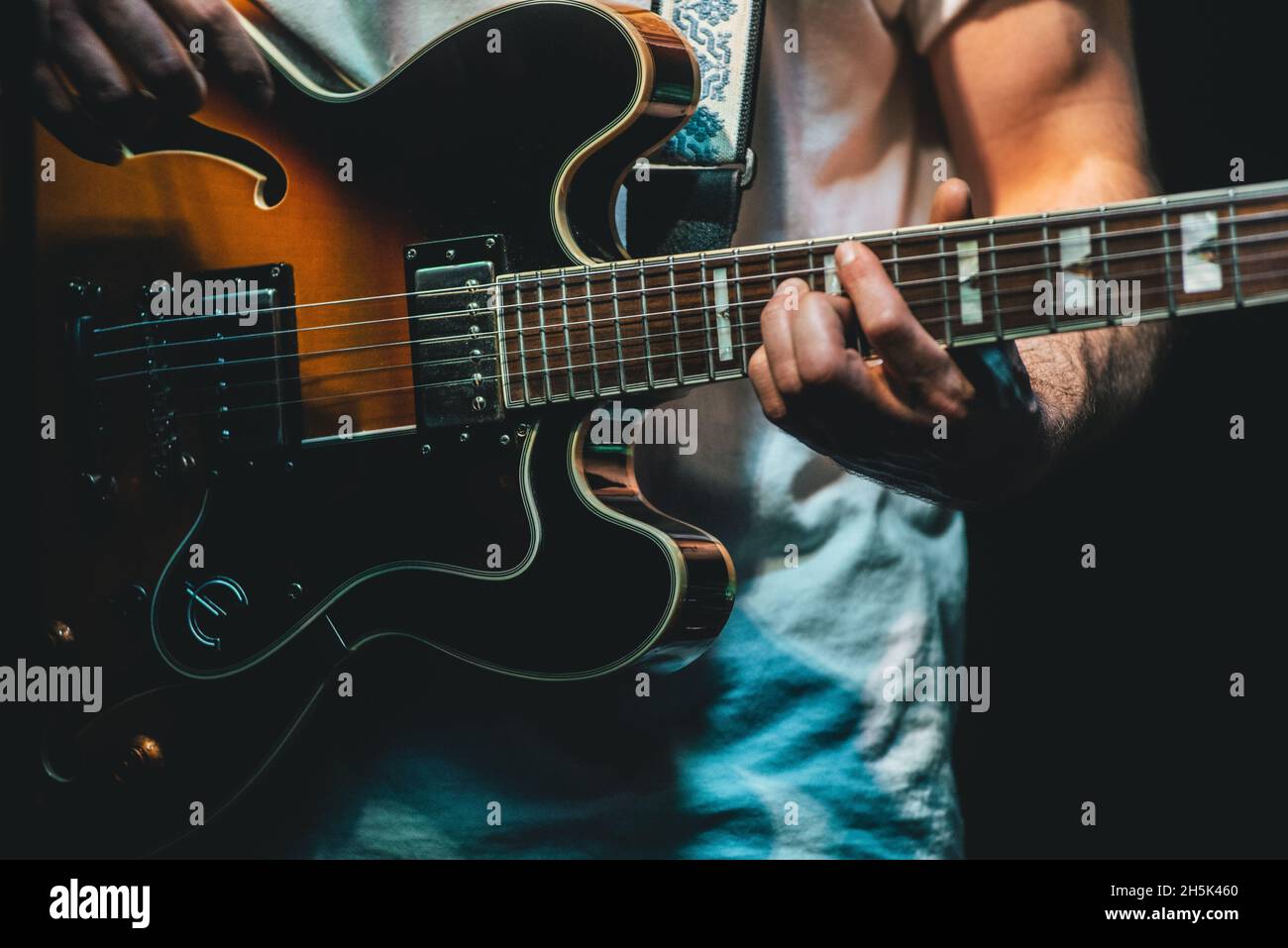Person acoustic guitar acoustic guitar hi-res stock photography and ...