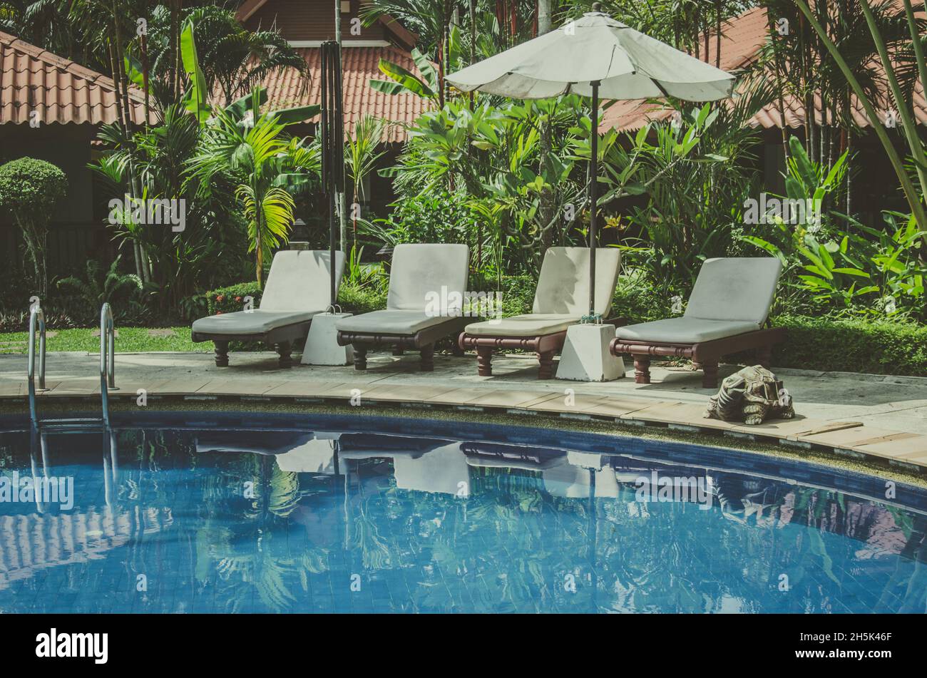 Beautiful luxury swimming pool in hotel resort Stock Photo - Alamy