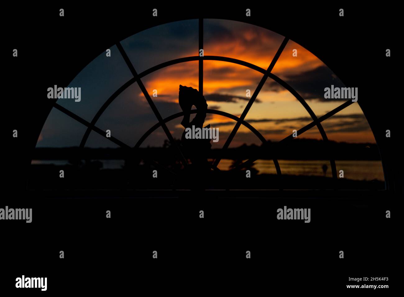 Sunset from the window frame Stock Photo - Alamy