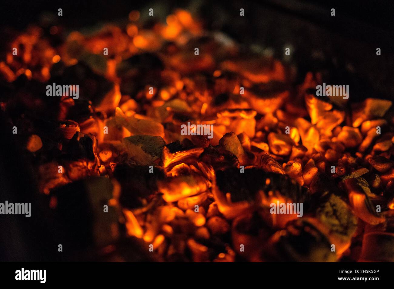 Closeup shot of the burning woods and coal in the fireplace Stock Photo ...
