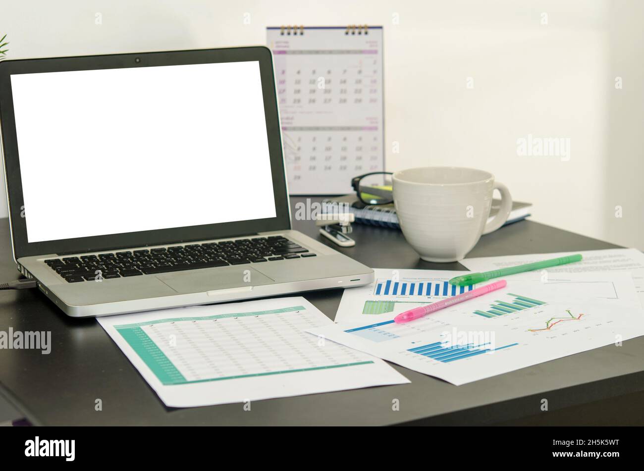 business workplace and computer and printed data sheet Stock Photo - Alamy