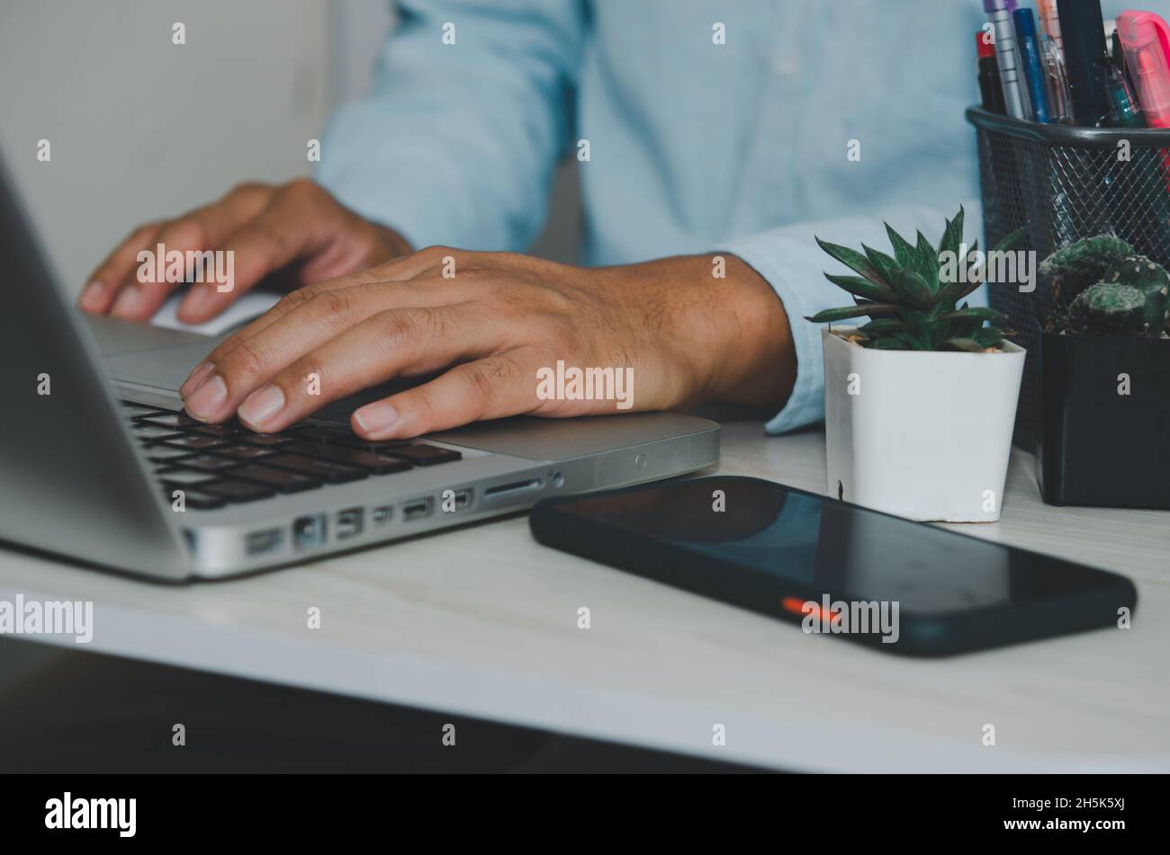 Man hand using laptop computer keyboard. Search the internet ...