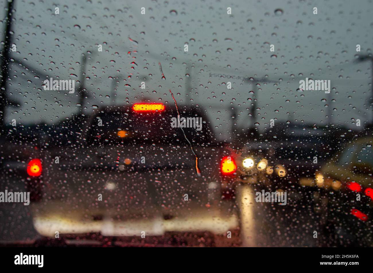 Car window Raindrops traffic jam at night Stock Photo - Alamy