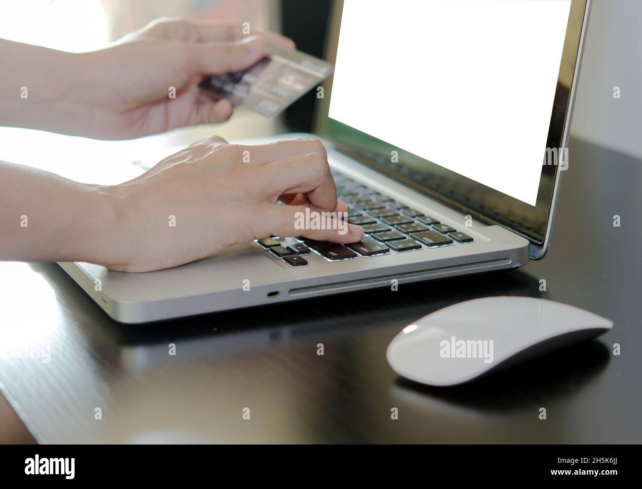 White laptop hands holding hi-res stock photography and images - Alamy