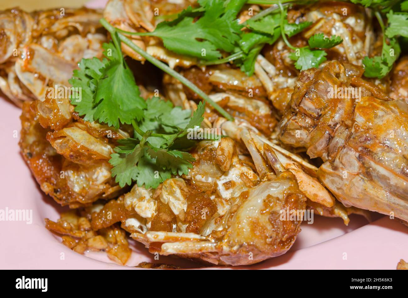 Mantis prawns stir with garlic, Thailand Seafood Stock Photo - Alamy