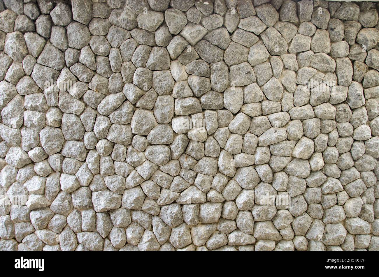 Rustic stone wall background Stock Photo - Alamy