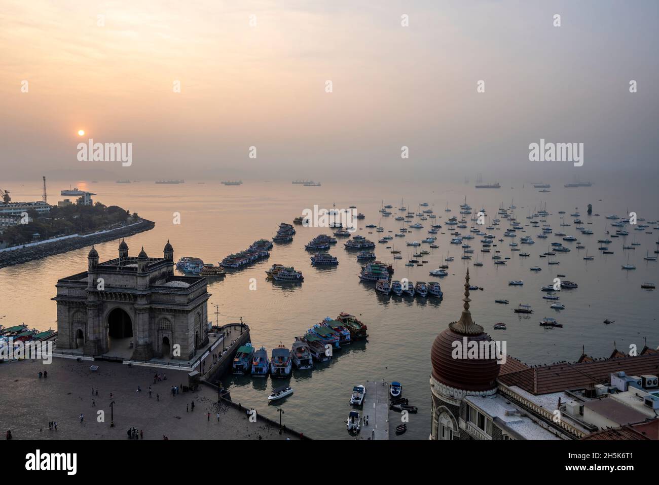 Sun rise over the harbor with the Gateway of India at dawn; Mumbai ...