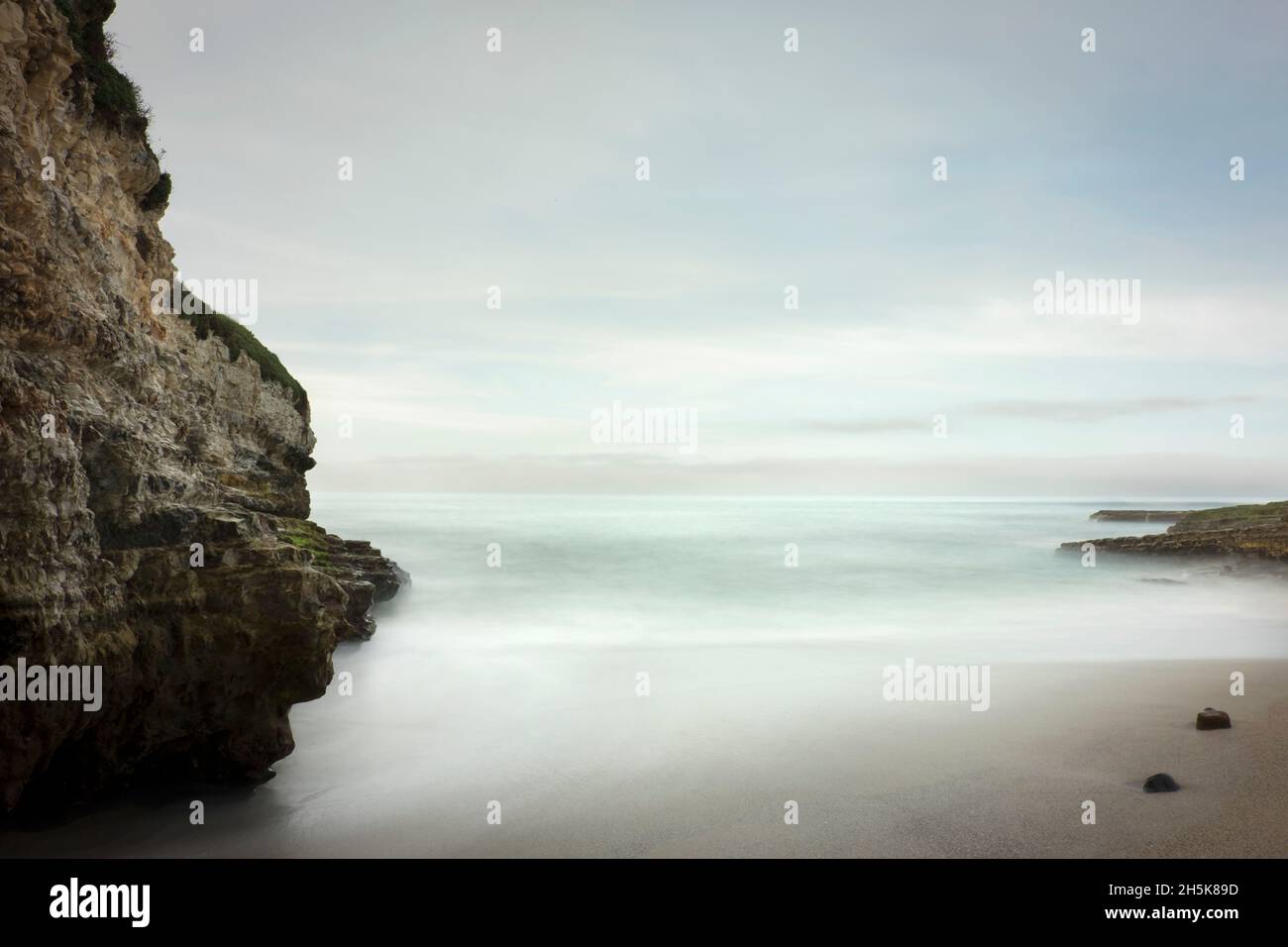 Rugged cliff and rock formations along the beach and coast at Wilder ...