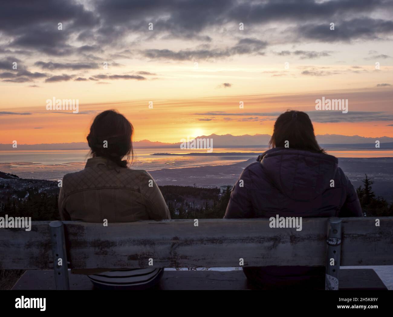 Two friends watching sunset hi-res stock photography and images - Alamy