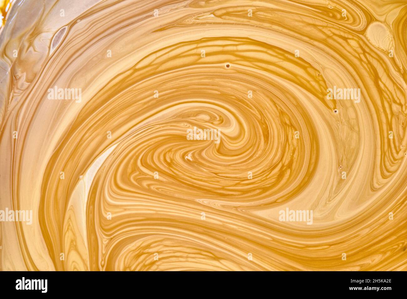 Swirl patterns in a can of paint, Greater Sudbury, Ontario, Canada ...