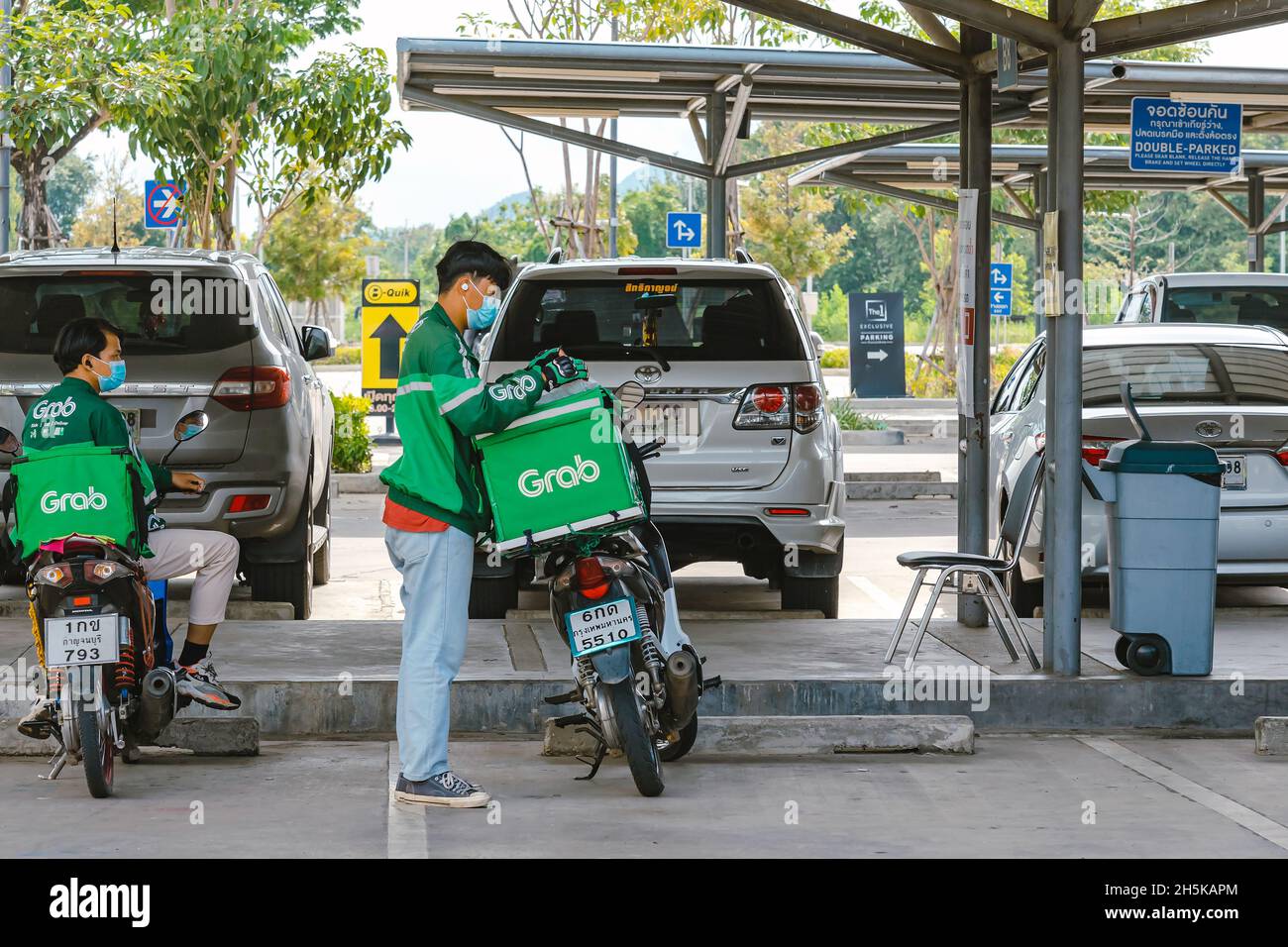 KANCHANABURI, THAILAND-AUGUST 22,2021 : Group of Grab riders park ...