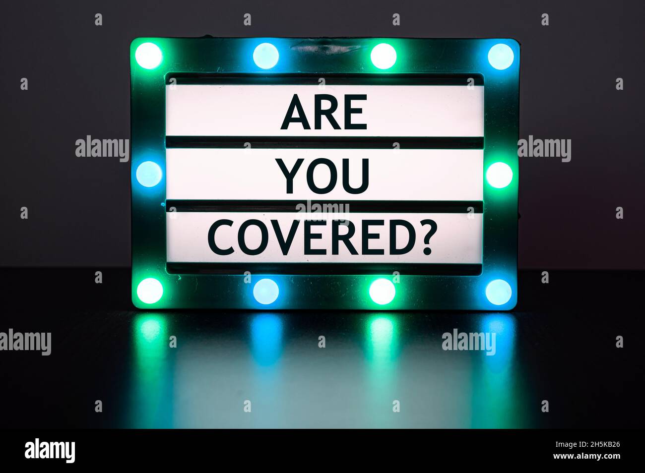 Lightbox with blue and green lights in dark room with words - are you ...