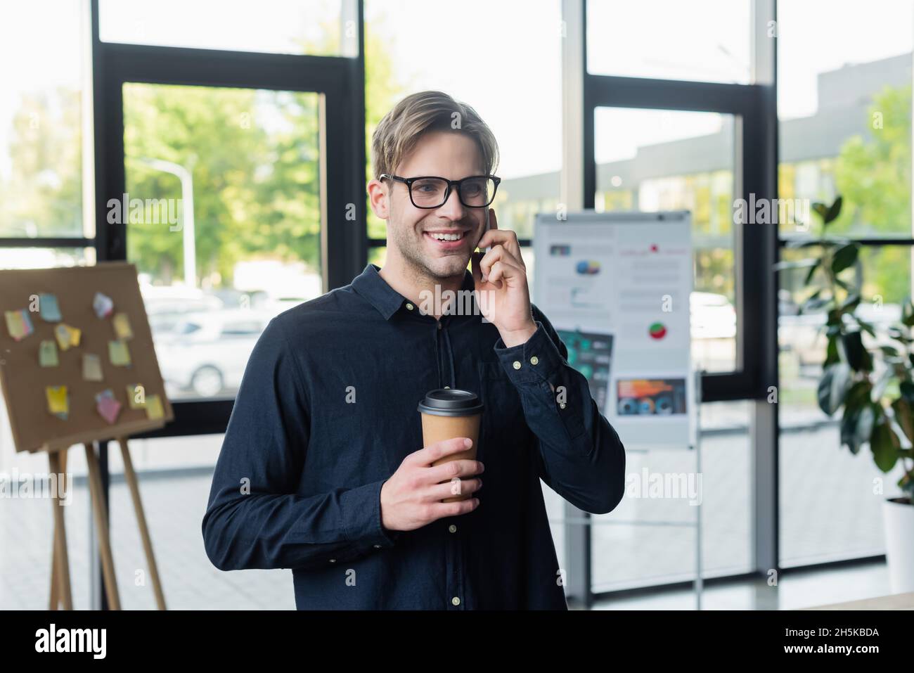 Smiling programmer coffee go hi-res stock photography and images - Alamy