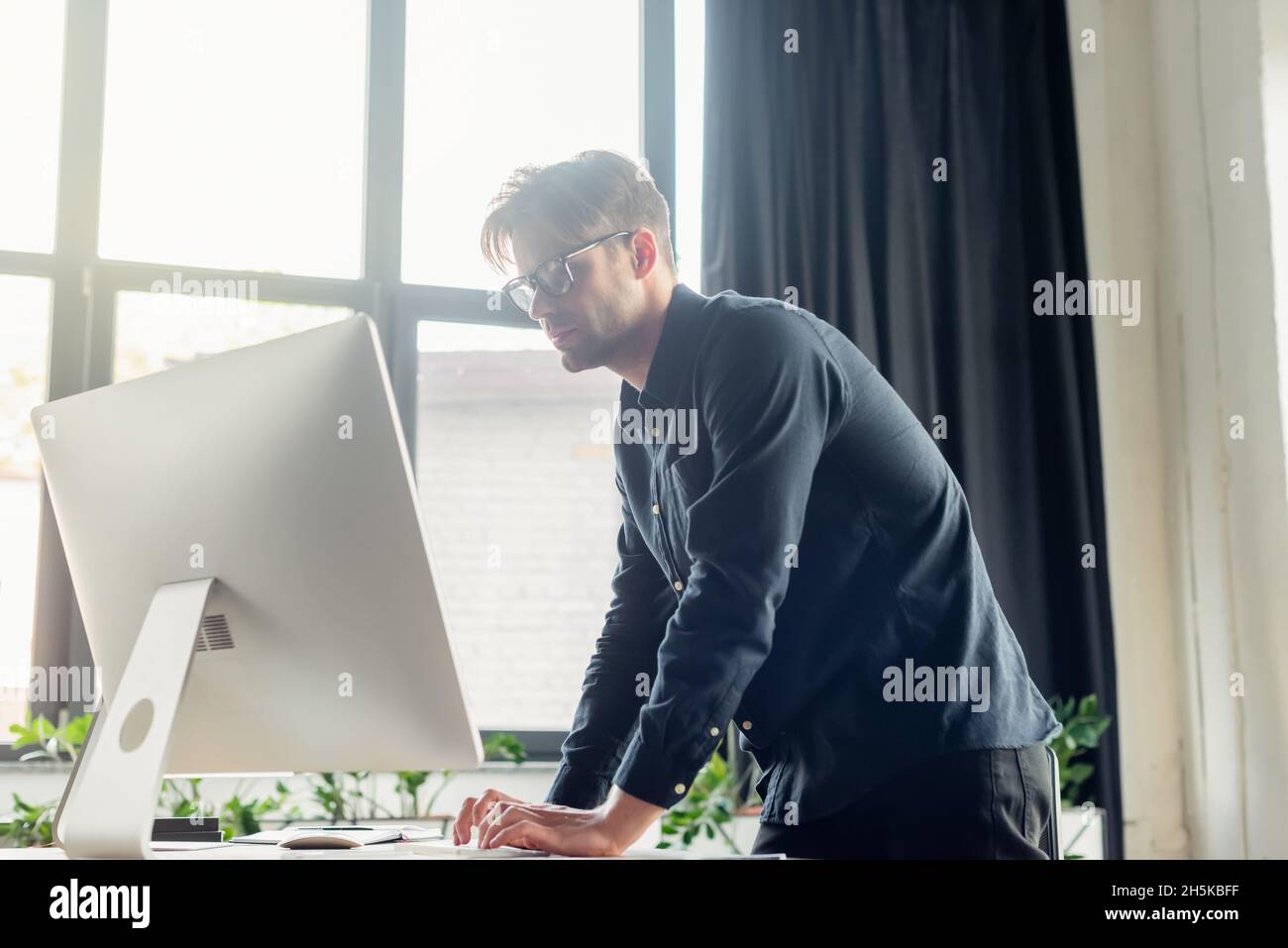 Monitor eyeglasses hi-res stock photography and images - Alamy