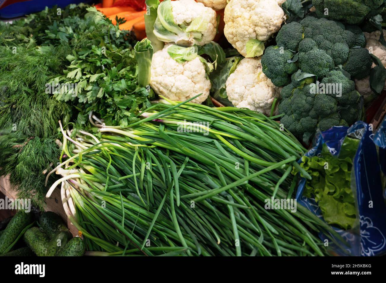 Green food background with assortment of fresh organic greens and ...