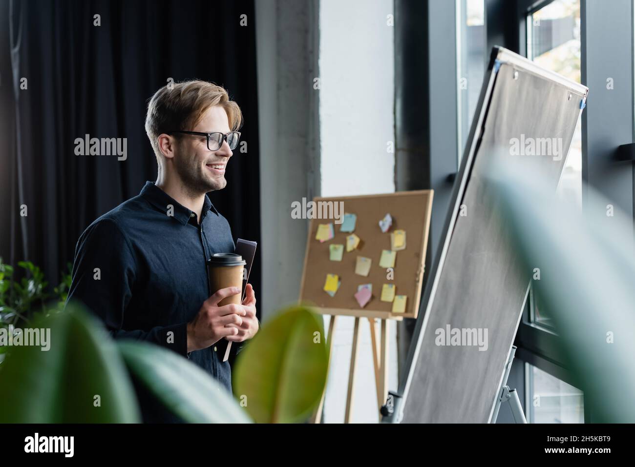 Smiling programmer coffee go hi-res stock photography and images - Alamy