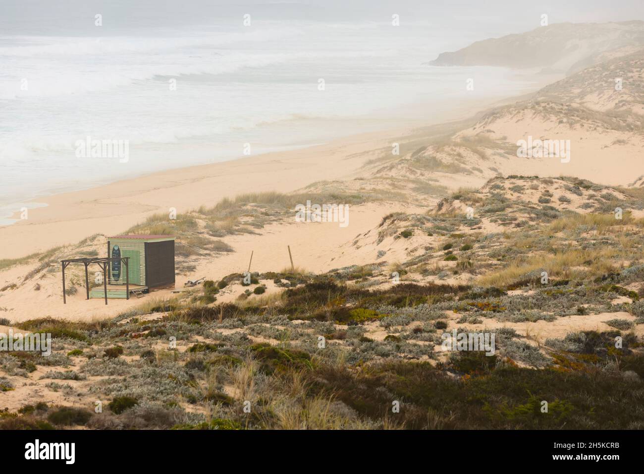 Praia do Malhao along the Alentejo coastline with misty air; Alentejo ...