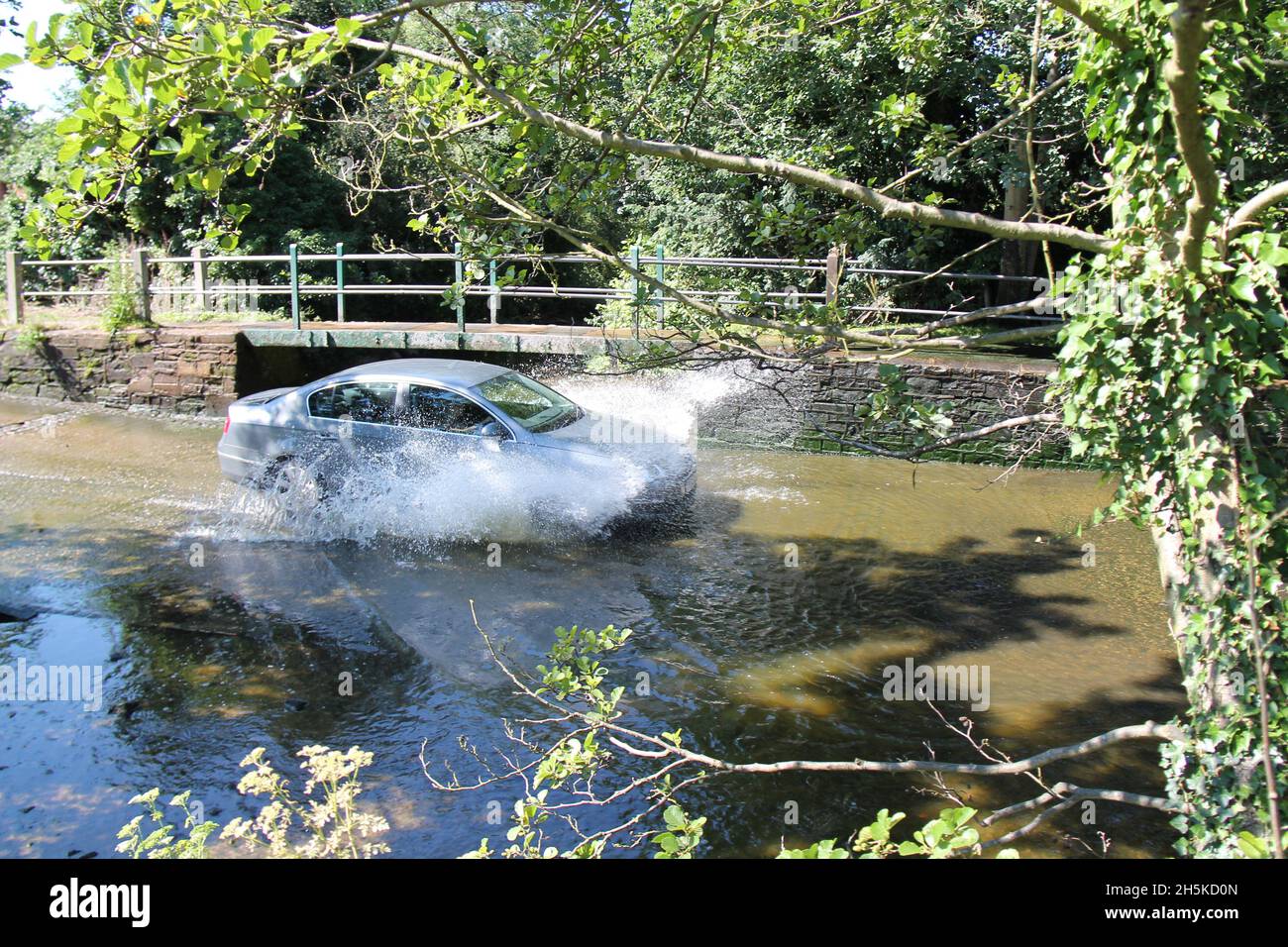 A Car Splashing Through a River Water Ford Stock Photo - Alamy