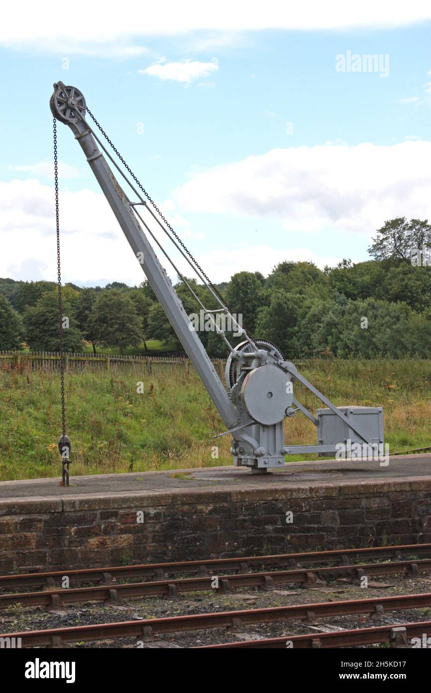 A Vintage Cargo Crane on a Trackside Railway Platform Stock Photo - Alamy
