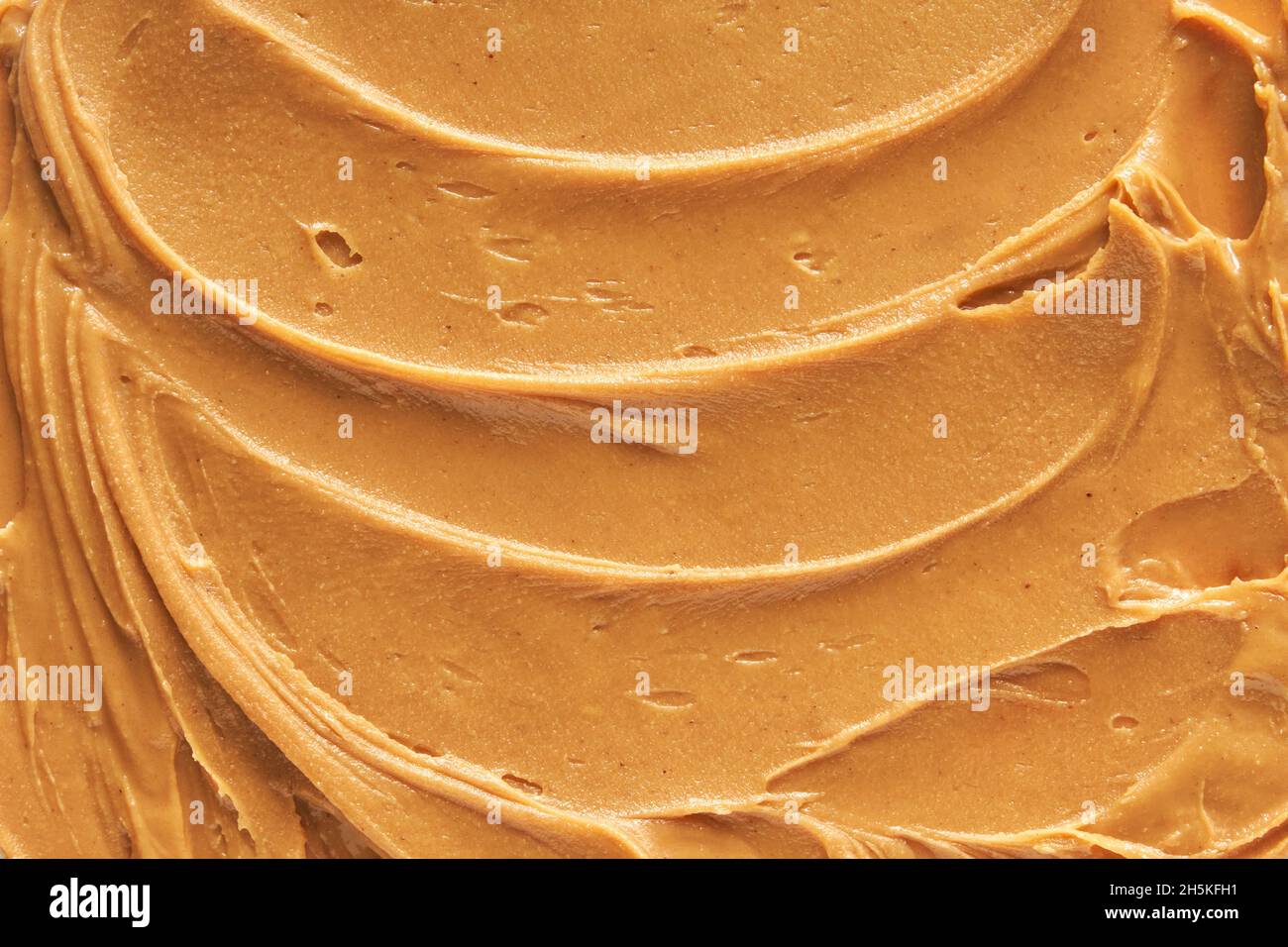 Peanut butter texture. Spread swirl. Organic keto food Stock Photo - Alamy