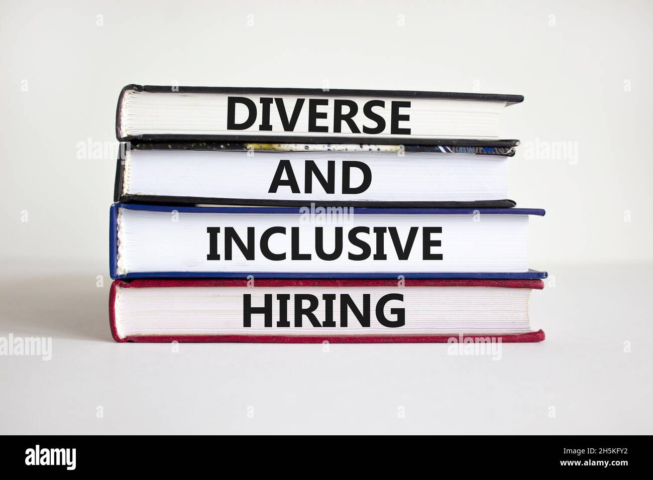 Diverse and inclusive hiring symbol. Books with words Diverse and ...