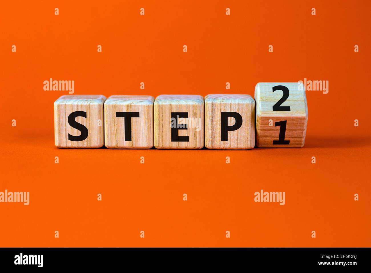 Step 1 or 2 symbol. Turned a wooden cube and changed words Step 1 to ...