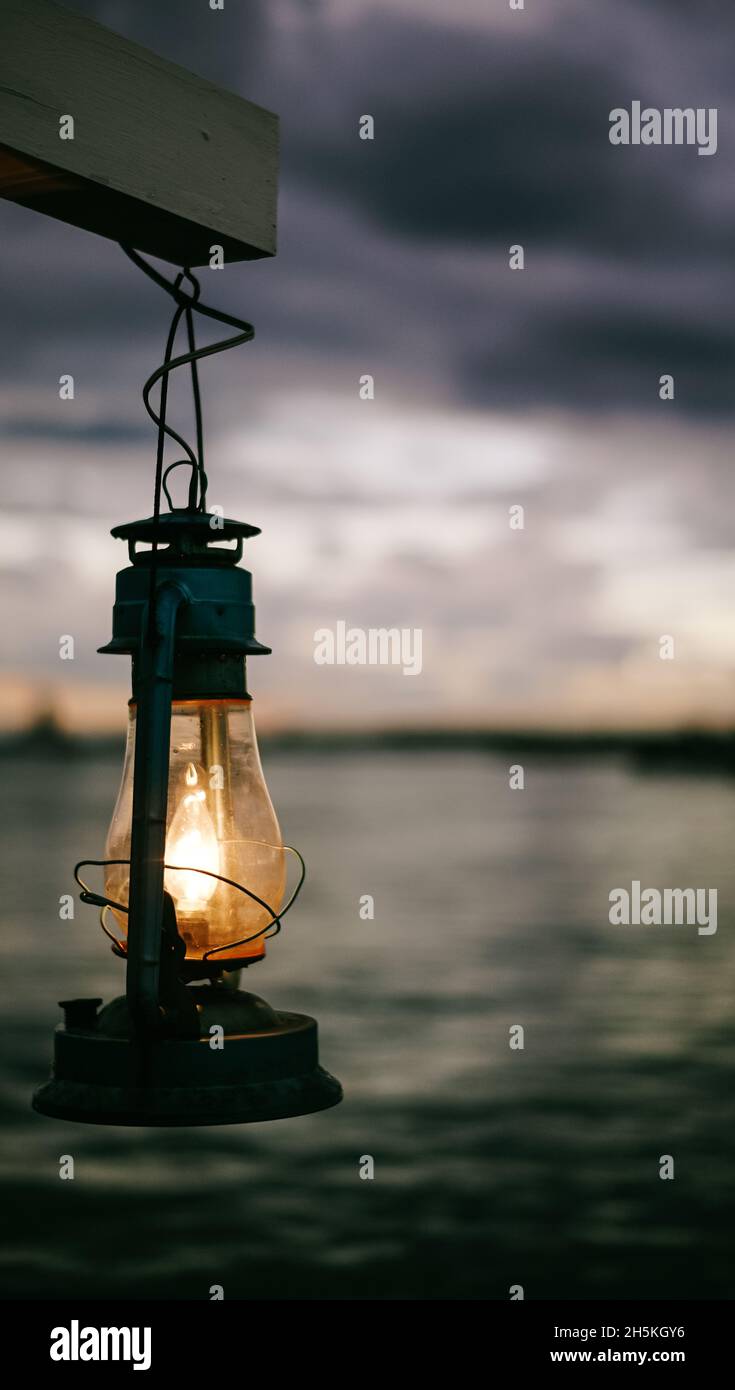 Sea Lantern on the background of the night sky and sea Stock Photo - Alamy
