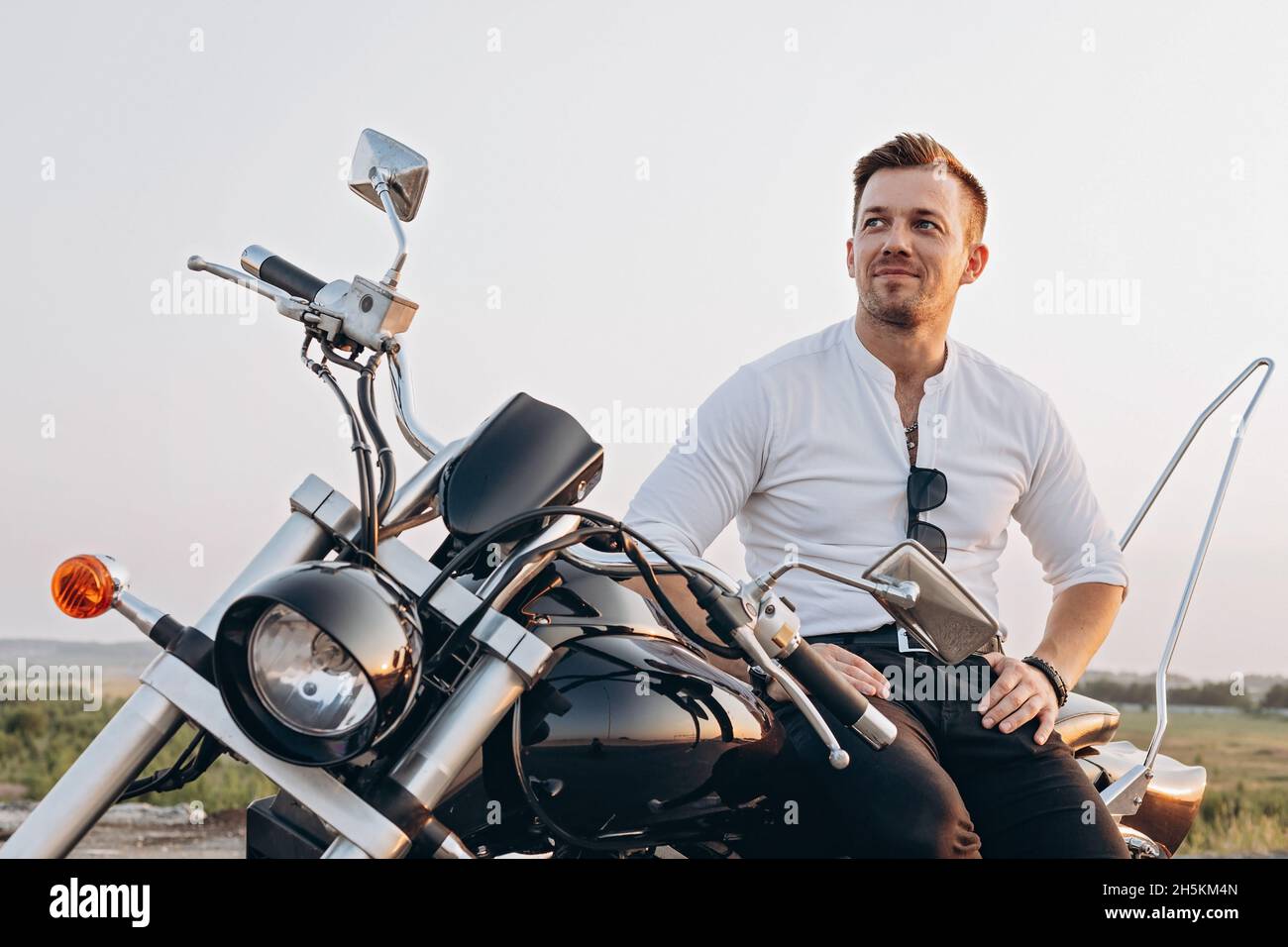 Stylish man on bike in hi-res stock photography and images - Alamy