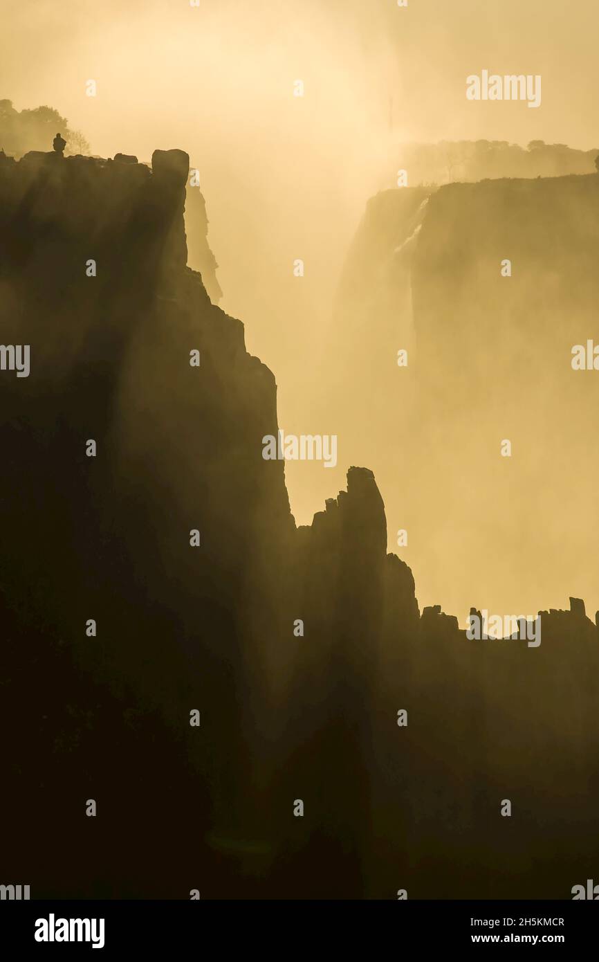 Mist over the cliffs of Victoria Falls Stock Photo - Alamy