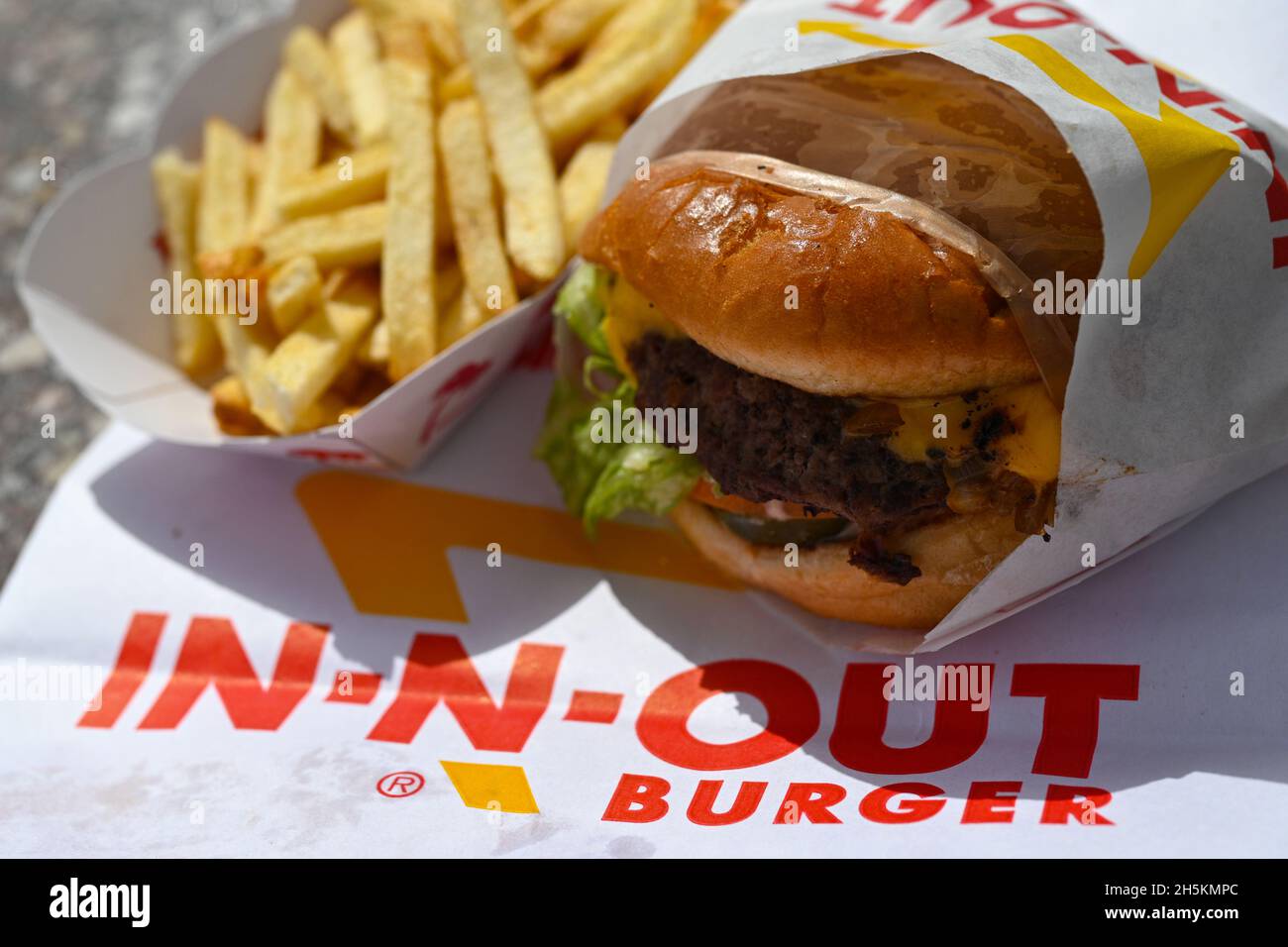 In-N-Out Burger's signature cheeseburger and french fries at an In-N ...