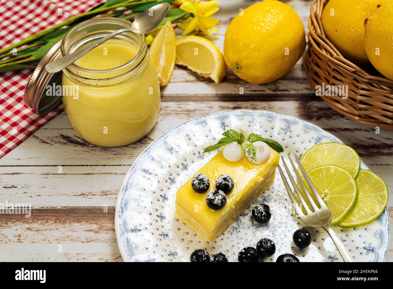 One Slice of homemade lemon curd cake in the shape of an ingot or brick ...