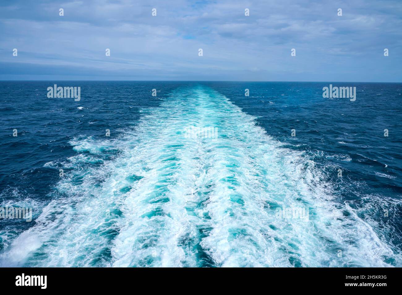 Wake behind a ship in the blue ocean water; Denmark Stock Photo - Alamy