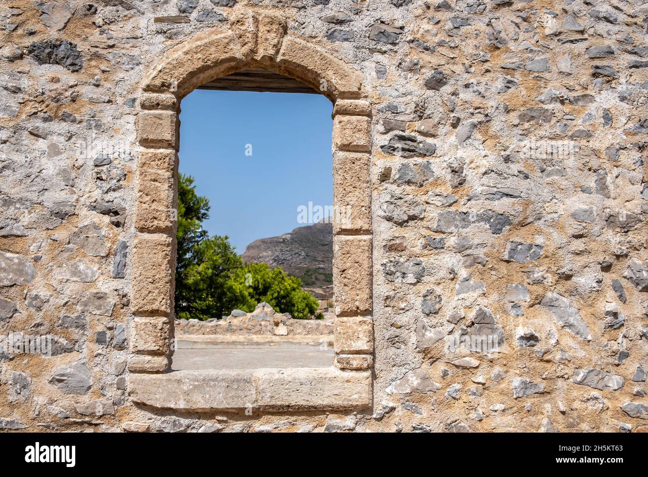 Window frame with arch on a stone wall at Venetian Castle Fortezza at ...