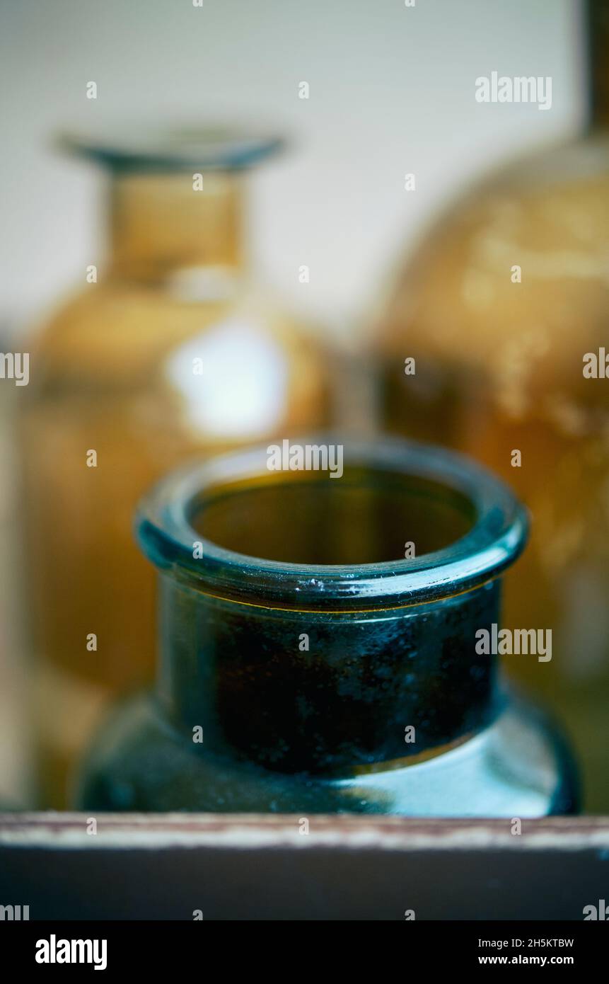 Still life of three old medicine bottles Stock Photo - Alamy