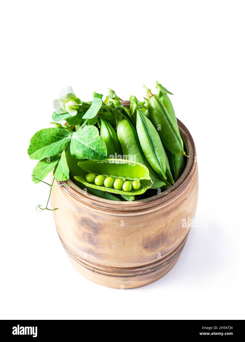 Fresh green pea in small cask isolated on white Stock Photo - Alamy