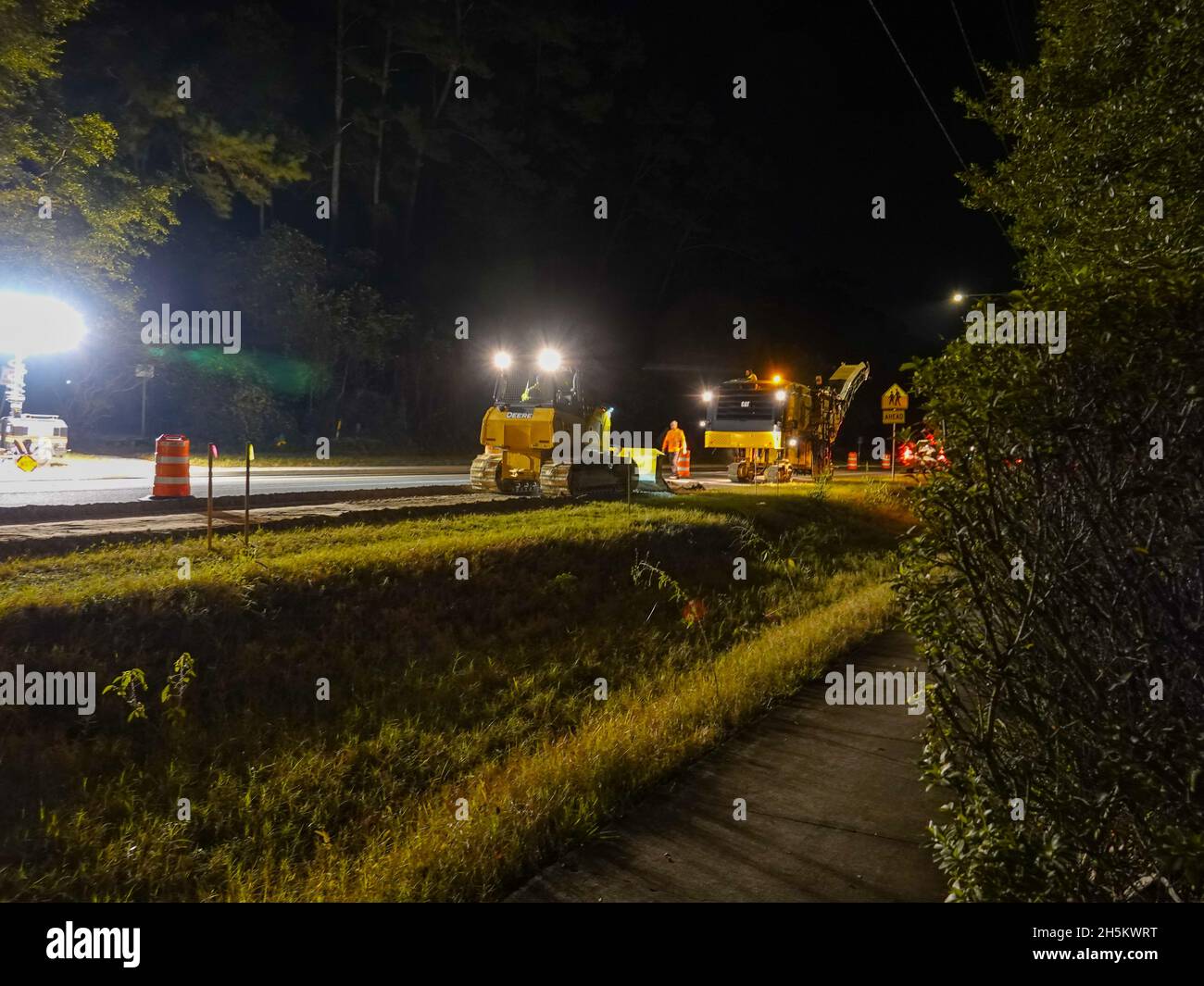 Crews, using heavy duty outdoor lighting, doing extensive nighttime ...