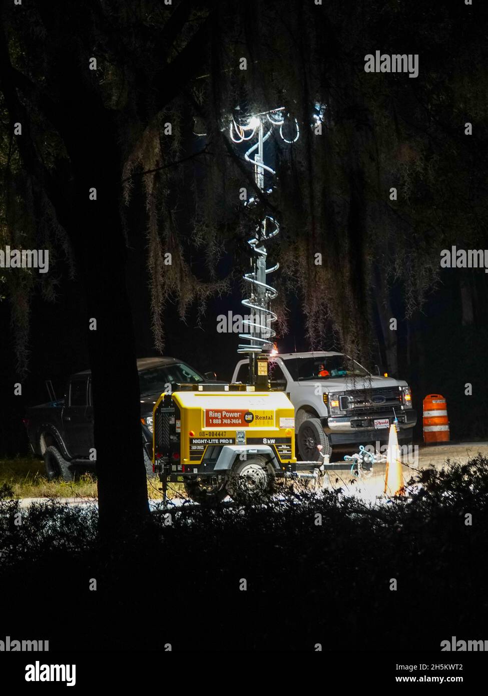 Crews, using heavy duty outdoor lighting, doing extensive nighttime ...