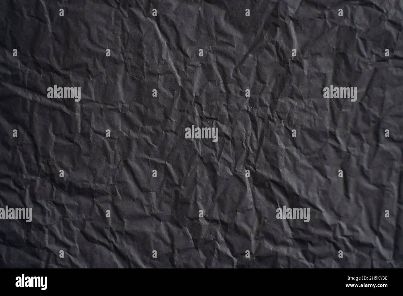 an empty wrinkled dark black tissue paper textured background Stock ...