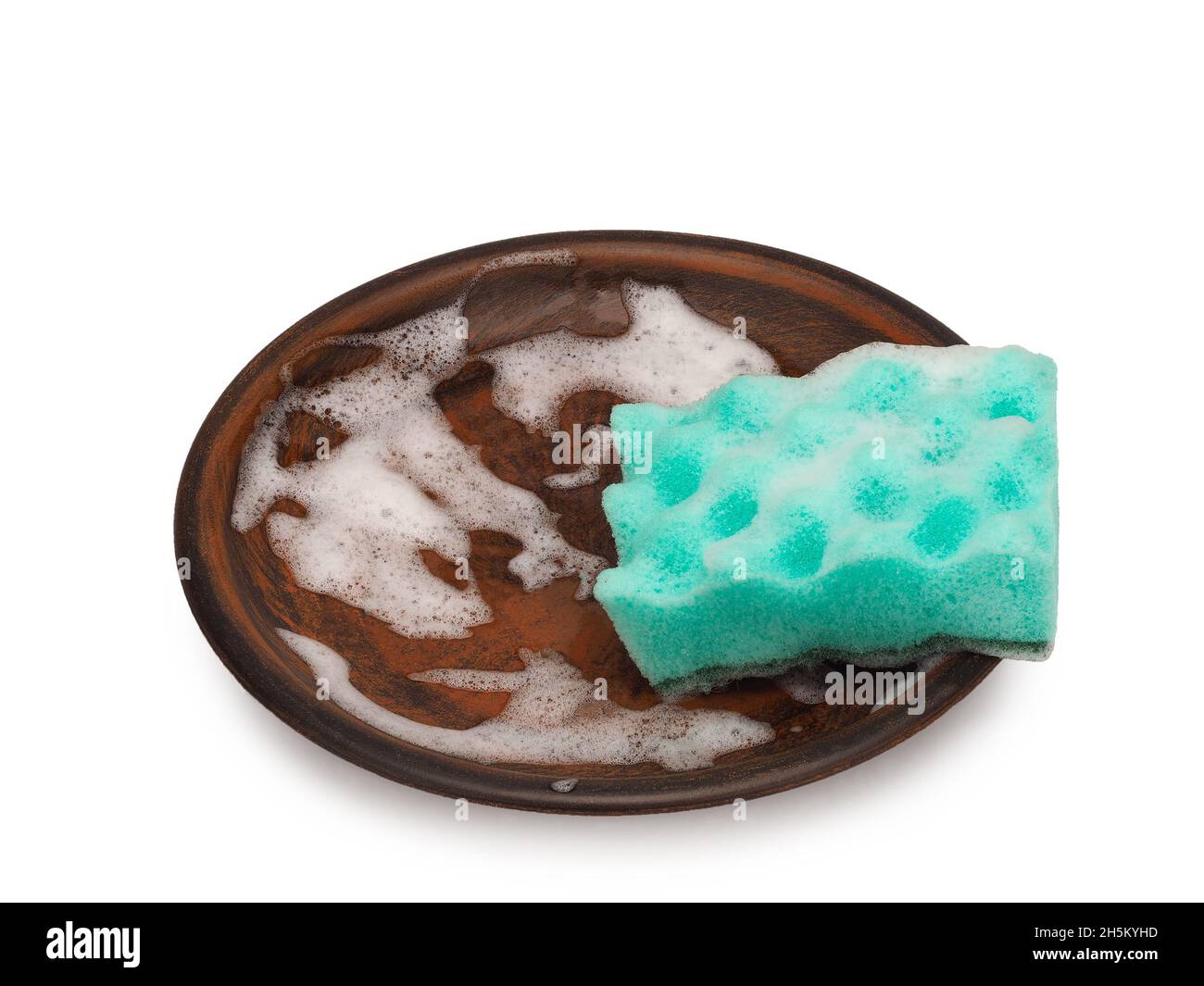 Scouring sponge in foam on a plate, dishwashing Stock Photo - Alamy