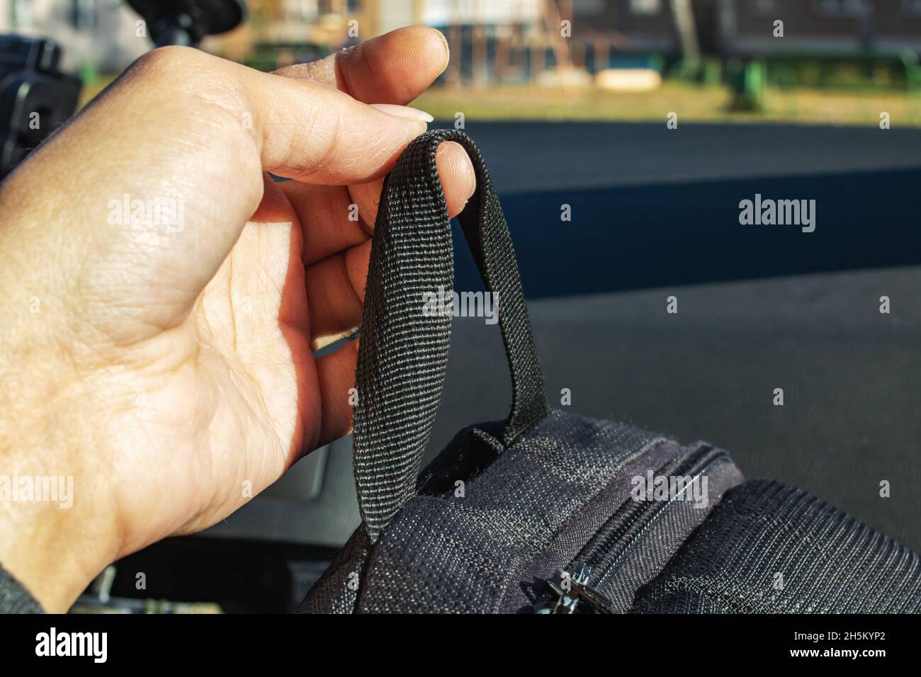 Hand holds bag gift hi-res stock photography and images - Alamy