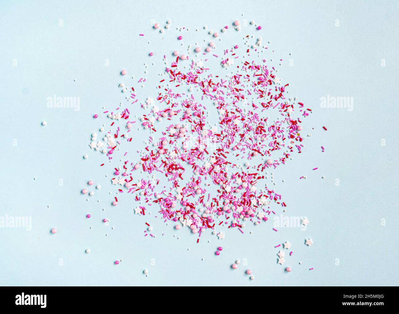 Colored sugar sprinkles background. Sugar sprinkle dots, decoration for ...