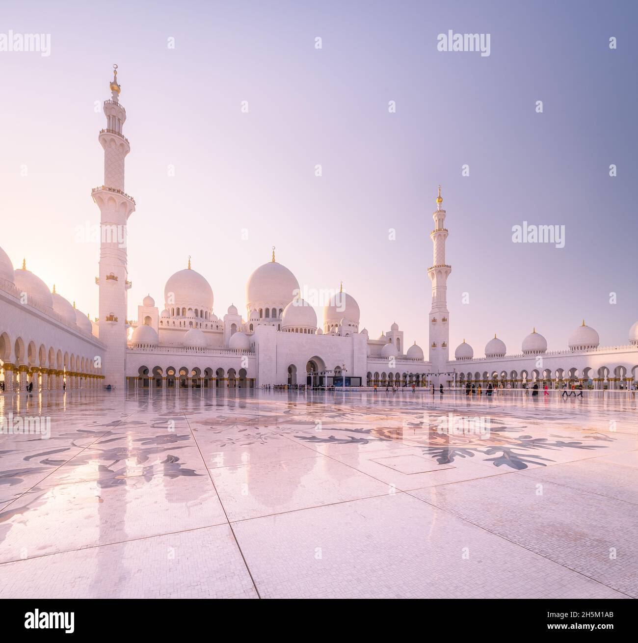 Sheikh Zayed Grand Mosque in Abu Dhabi during pink sunset. View of ...