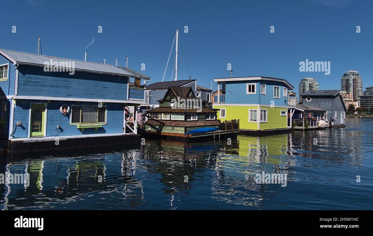 Colorful floating houses at Fisherman's Wharf in Victoria downtown ...
