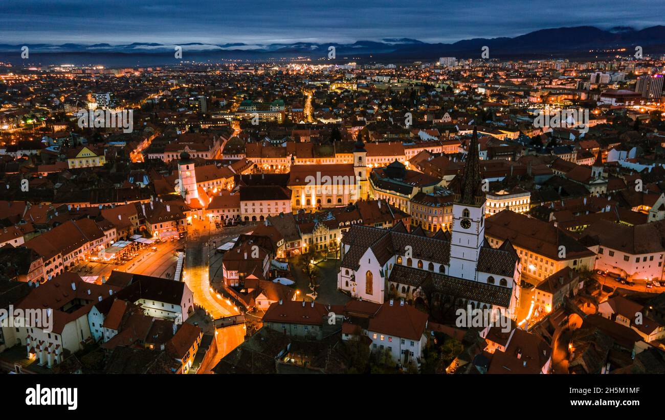 Aerial photography of Sibiu city center shot from a drone at sunset ...