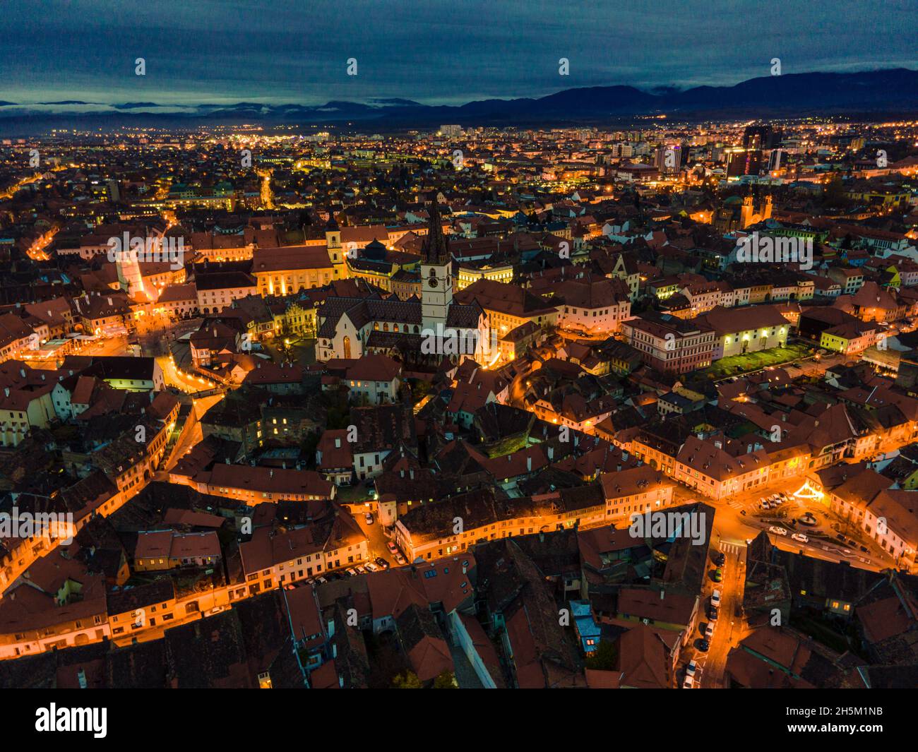 Aerial photography of Sibiu city center shot from a drone at sunset ...