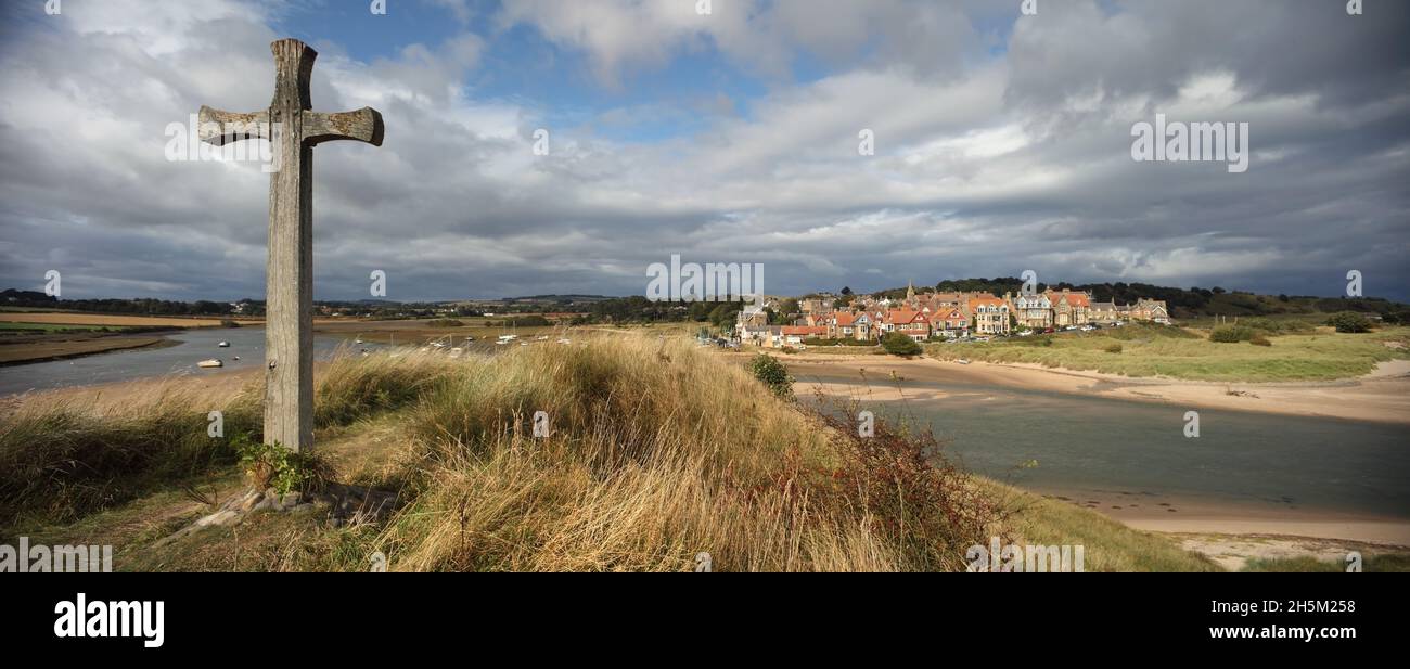 St. Cuthbert's cross and the village of Alnmouth at the mouth of the ...