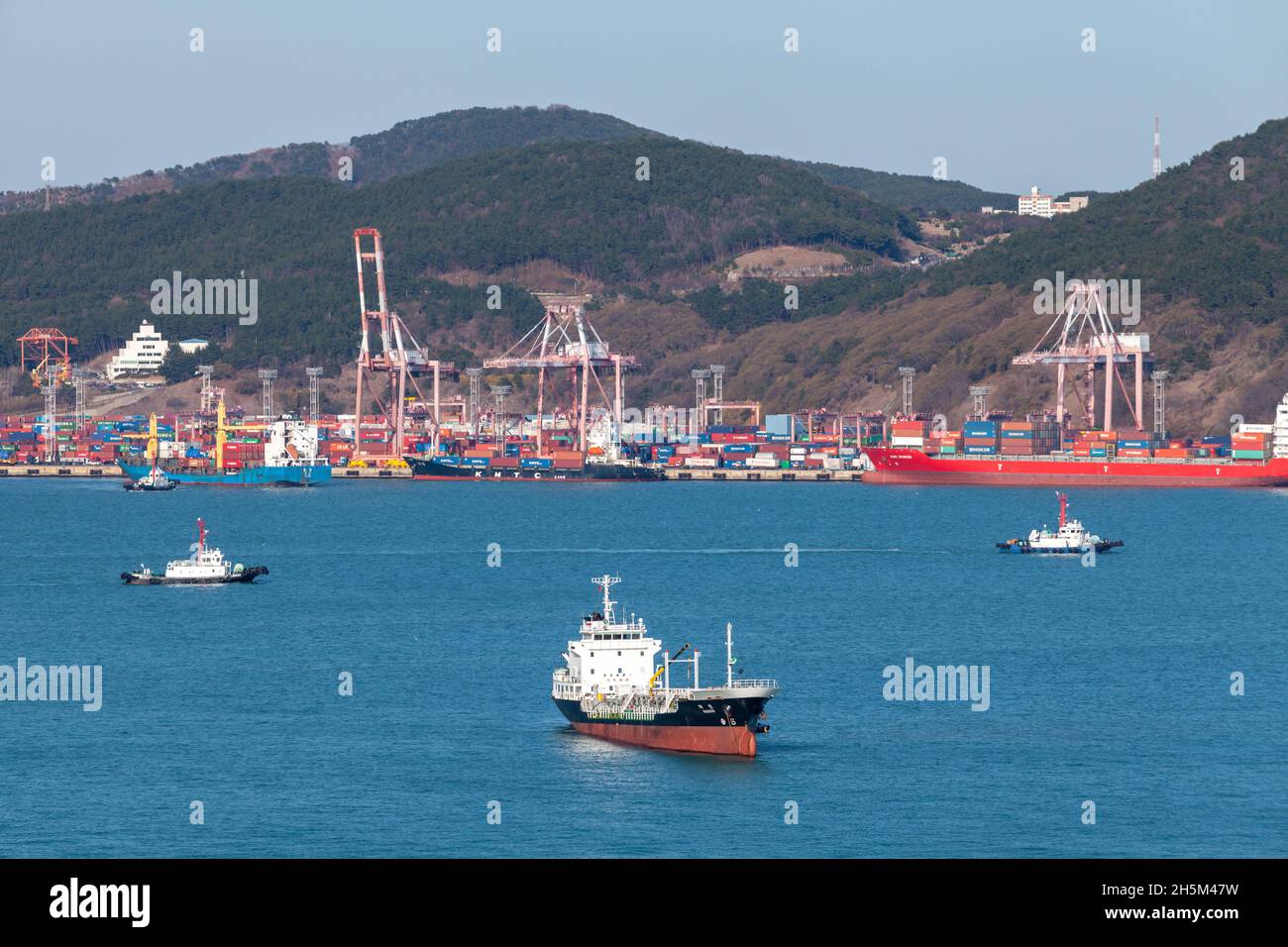 Busan, South Korea - March 22, 2018: Industrial cargo ships are in ...